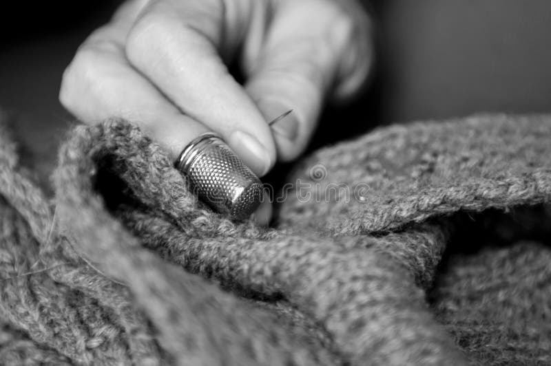 Black and White Image of Woman Sewing Stock Image - Image of holding ...