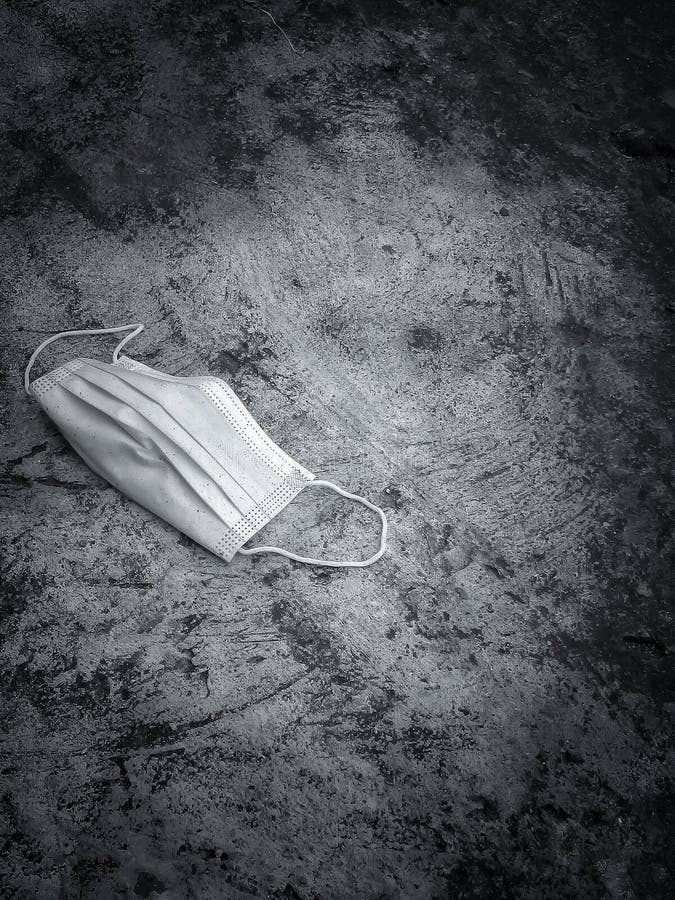 Black and White Masks on Asphalt Stock Photo - Image of masks, asphalt ...
