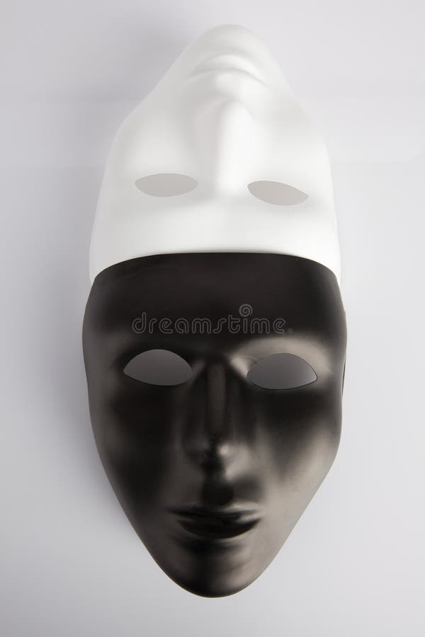 Black and White Masks Joined on White Reflective Background. Ver Stock ...