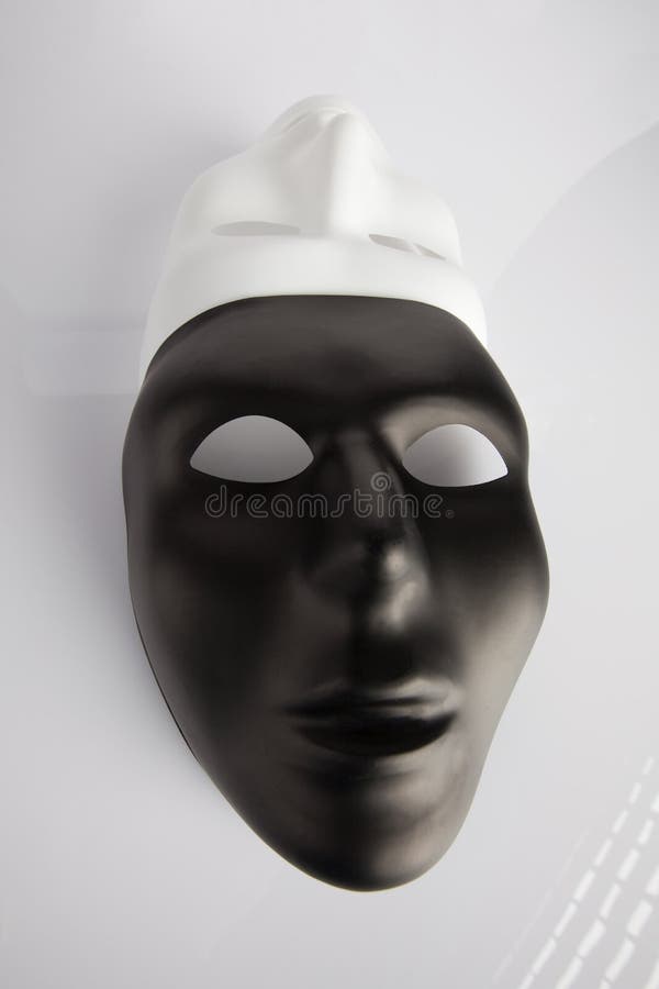 Black and White Masks Joined on White Reflective Background. Wid Stock ...