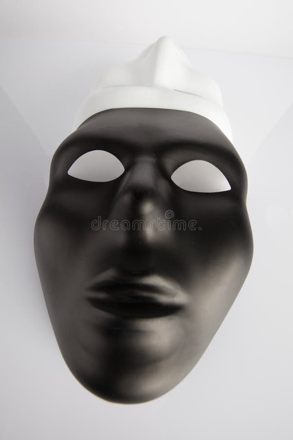 Black and White Masks Joined on White Reflective Background. Wid Stock ...