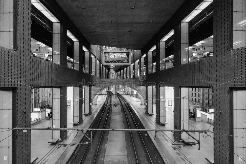 Black and White of a Modern Underground Train Station with Symmetrical ...