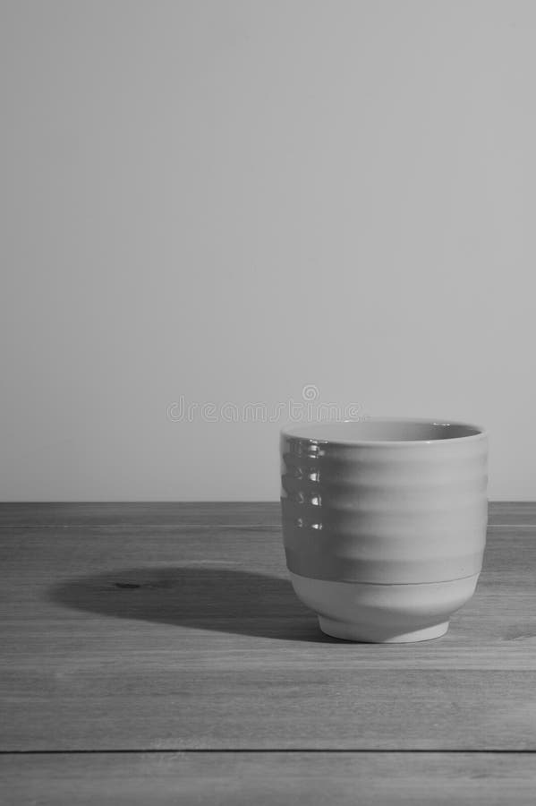 Black And White Monochrome Image Of Pot On An Empty Wooden Table Stock Image Image Of Empty