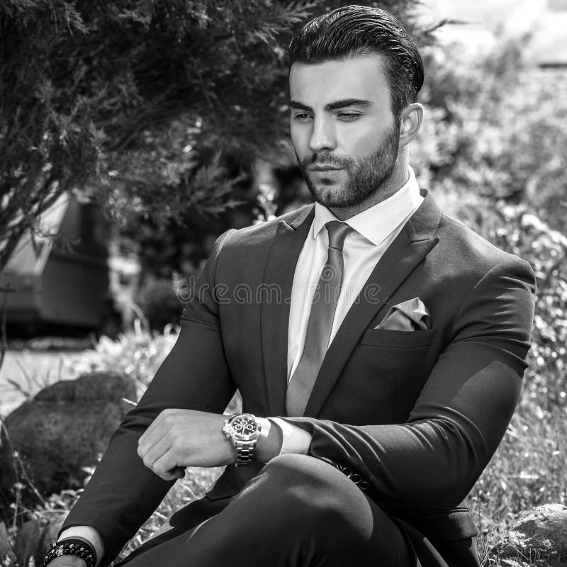 Black White Outdoor Portrait Of Elegant Handsome Man In Classical Suit