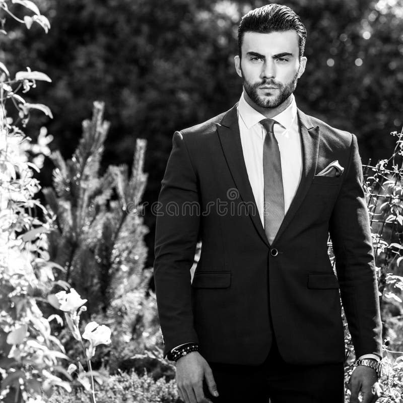 Black White Outdoor Portrait Of Elegant Handsome Man In Classical Suit