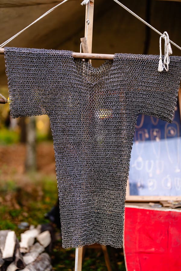 A Black and White Patterned Garment Hangs on a Wooden Post Stock Image ...
