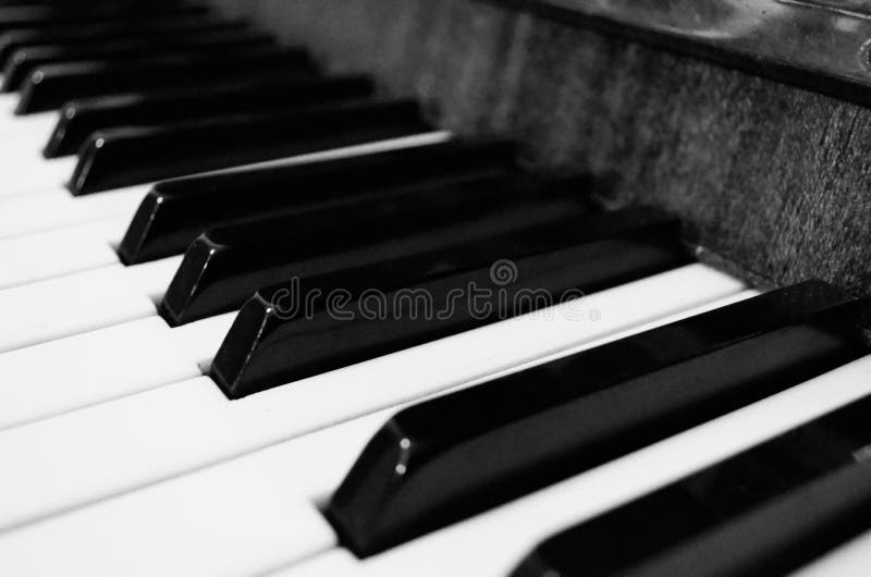 Piano with Black and White Keys in Detail with a Wooden Stock Image ...