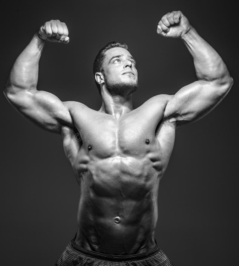 Awesome Muscular Guy Posing in Studio. Stock Image - Image of active ...