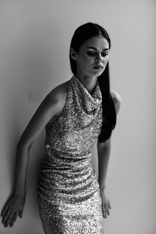 Black And White Portrait Of A Stylish Woman In An Evening Dress With Glitter Eye Makeup Disco