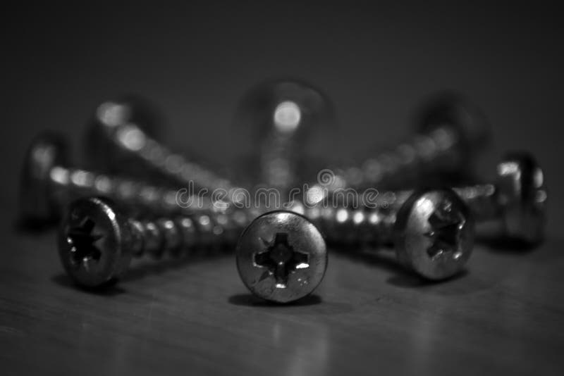 Screws Arranged in a Circle Stock Photo - Image of silver, white: 158967468