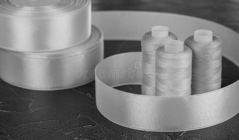 Black and White Sewing Kit. Bobbin Threads and Satin Ribbon Stock Photo ...