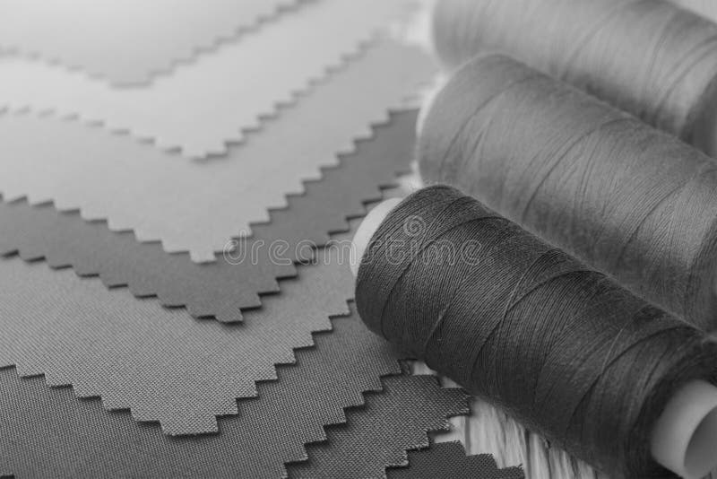 Black and White Sewing Kit. Sewing Threads and Fabric Samples Stock ...