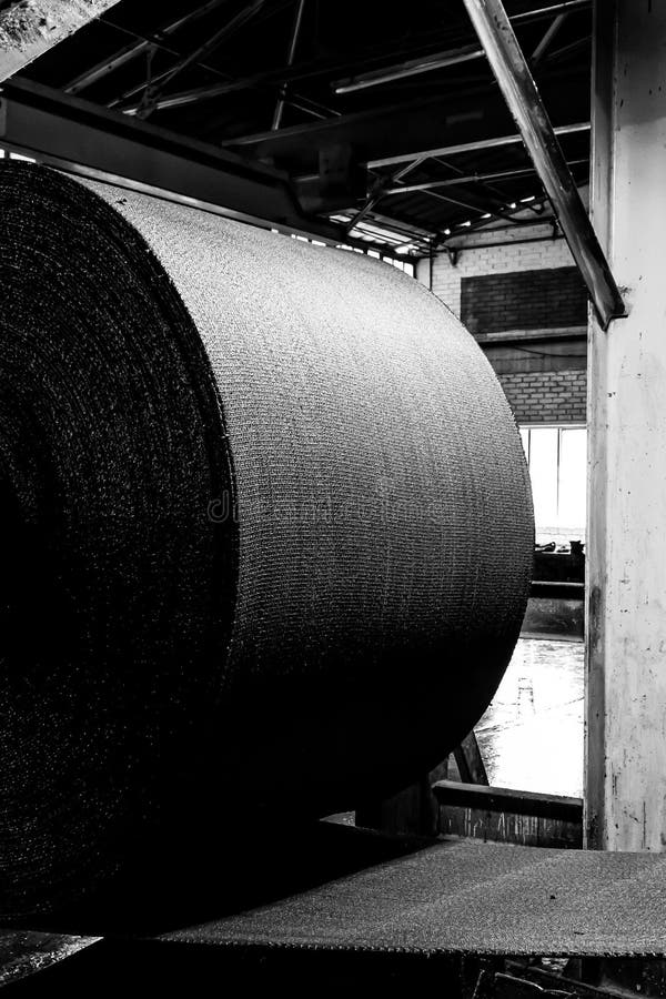 Black and White Shot of a Large Industrial Roll of Material in a ...