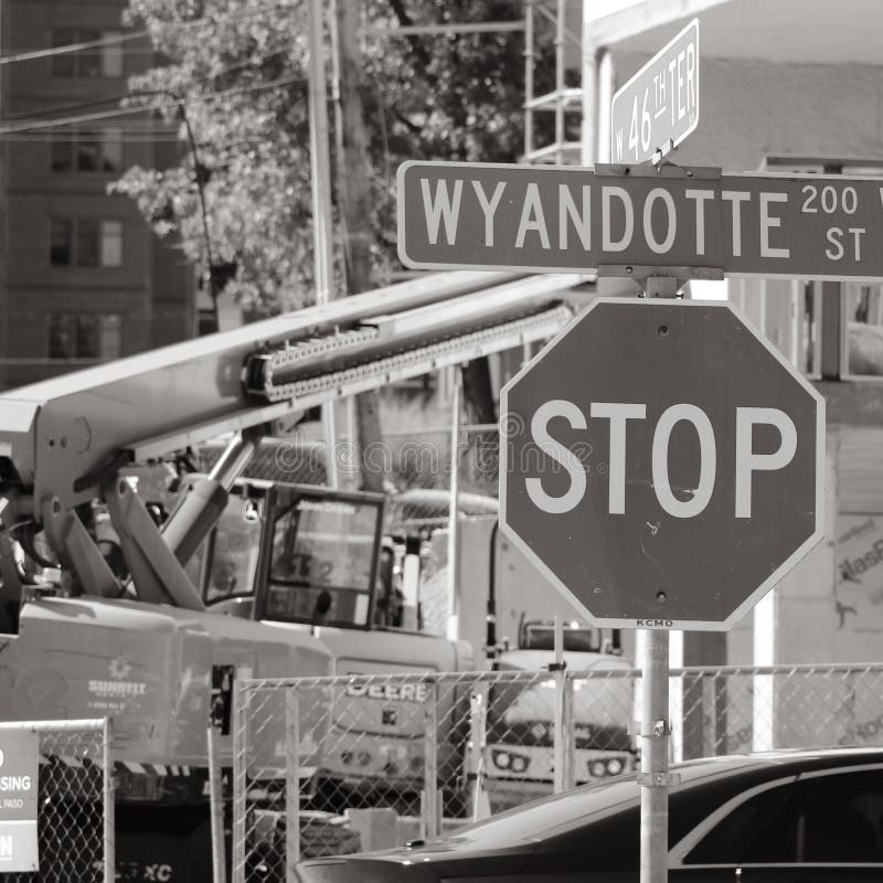 Black and White Shot of Traffic Signs on the Sidewalk Stock Photo ...