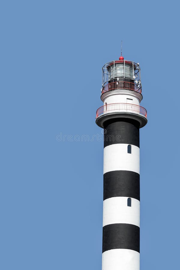Black and White Striped Lighthouse on a Blue Background Stock Image ...