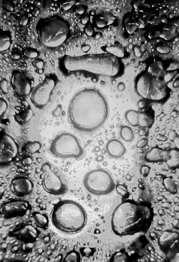 Black and White Surface of Speckled Glass with Light Behind Stock Image ...