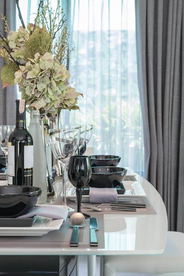 Black and White Table Set on White Dining Table Stock Photo - Image of ...