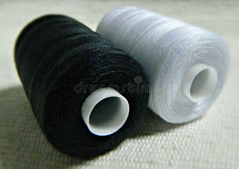Black and White Thread on White Background Stock Photo - Image of ...