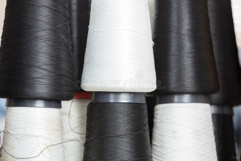 Black and White Thread Spools at Factory Stock Photo - Image of ...