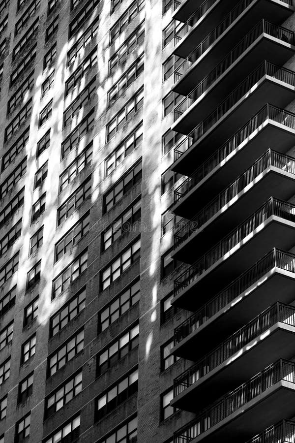 Abstract Highlight Casting on Side of Tall Building Stock Photo - Image ...