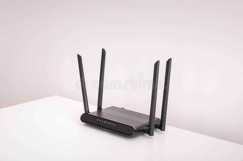 Black Wifi Router on White Table Indoors Stock Image - Image of ...
