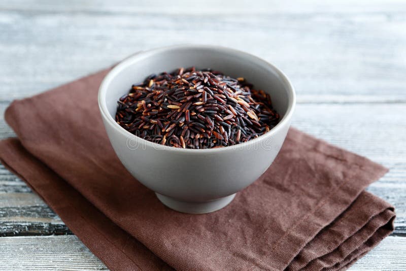 Black Wild Rice in a Clay Bowl Stock Image - Image of healthy, close ...