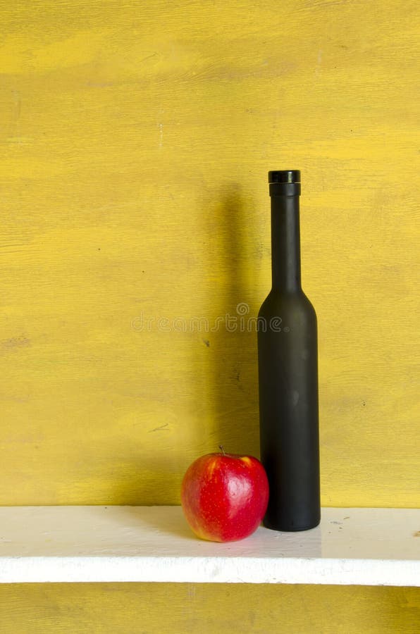 Black Wine Bottle and Red Apple Stock Image - Image of style, white ...