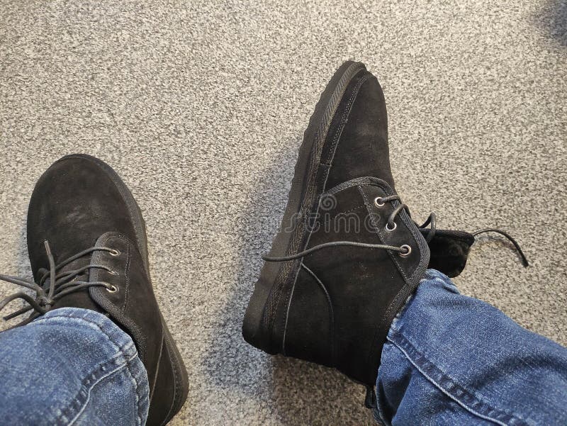 Black Winter Suede Boots on the Feet. First-person View Stock Image ...