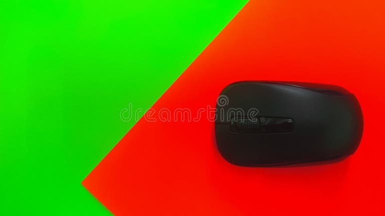 Black Wireless Mouse on a Red and Green Background Stock Photo - Image ...