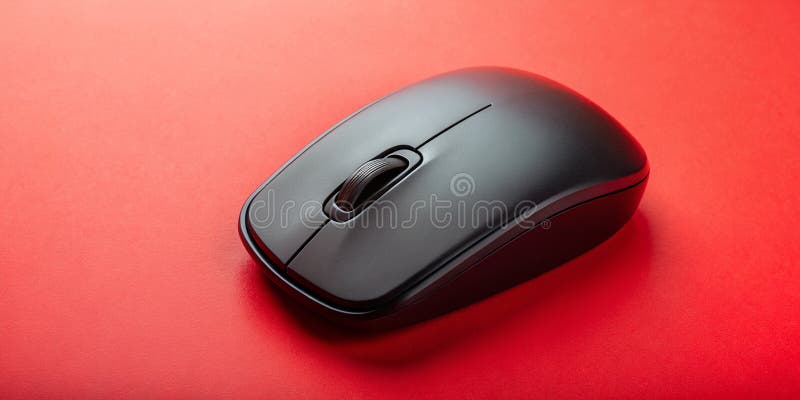 Black Wireless Mouse on Light Red Background Modern Black Wireless ...