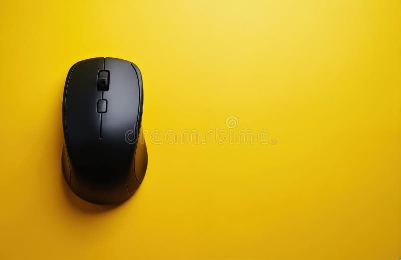 Black Wireless Mouse on Yellow Background. Computer Peripheral Device ...