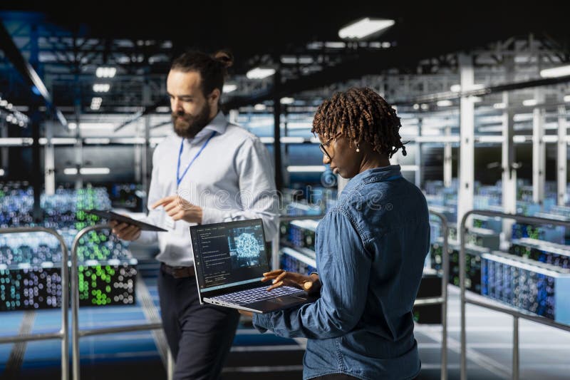Black Woman Engineer Overseeing Code Debugging Tech on Laptop Stock Photo - Image of screen ...