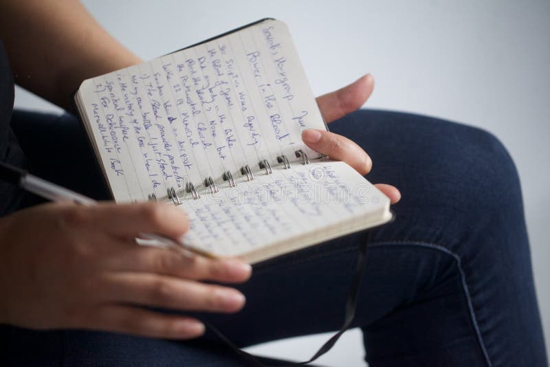 Black Woman Holding a Notebook Stock Image - Image of womans, looking ...