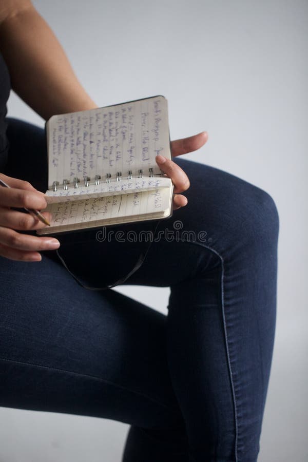 Black Woman Holding a Notebook Stock Photo - Image of book, notes ...