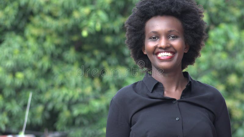 A Strong Black Woman Flexing Muscles Stock Video - Video of tendons ...