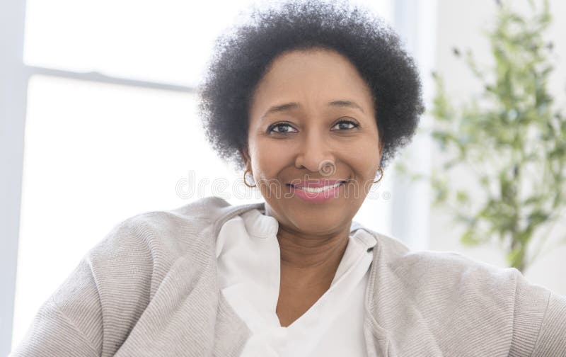 Black Woman Sitting on Sofa at Home Stock Image - Image of indoors ...