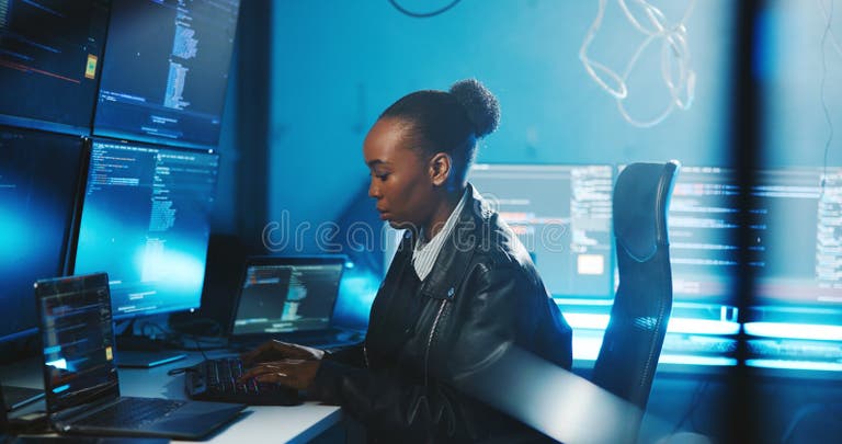 Black Woman, Typing and Coding on Computer at Night for Programming, Cyber Attack and Online ...