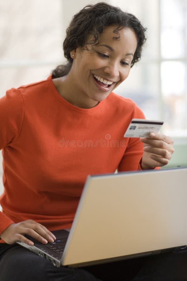 Black Woman Using Credit Card and Laptop Stock Image - Image of black ...