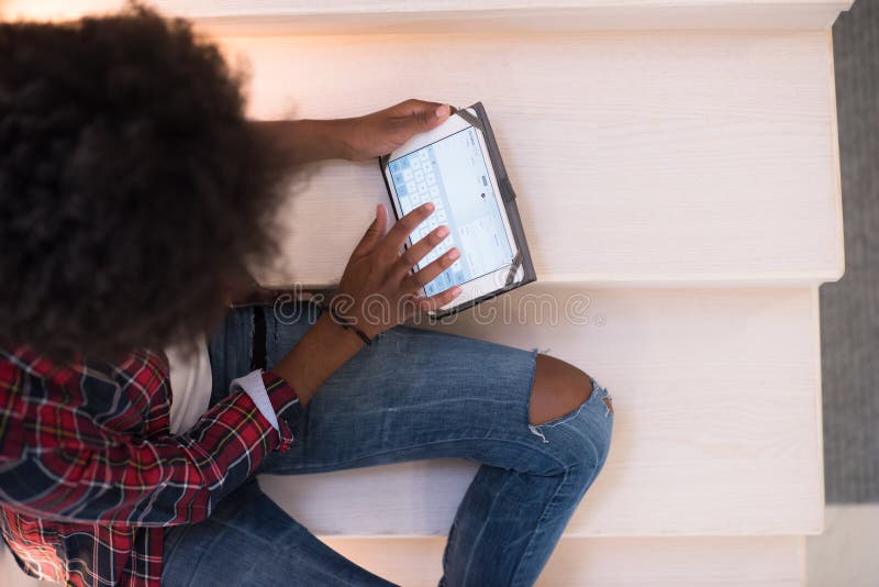 Black Woman Using Her Electronic Tablet Stock Image - Image of ...