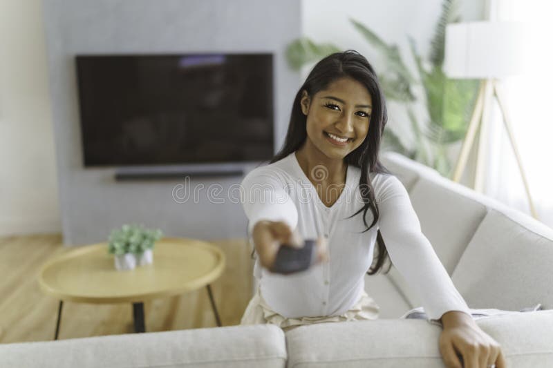 Black Woman Watching Television at Home Sit on Sofa Stock Image - Image ...