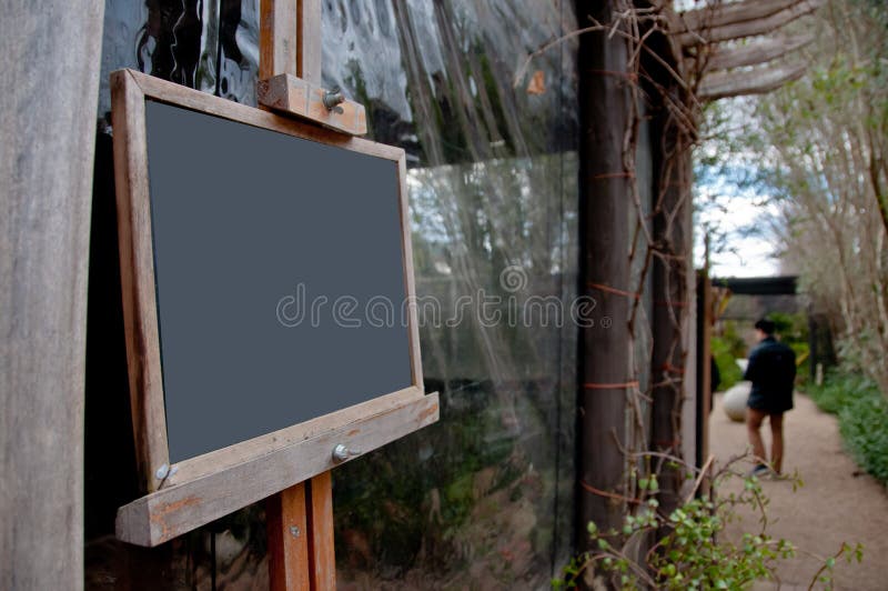 Black Wooden Frame Board in a Garden Stock Image - Image of outdoor ...