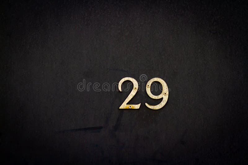 House Number 29 on a Black Background Stock Photo - Image of black ...