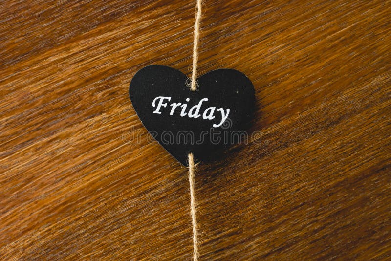 Black Wooden Heart with Day of the Week Written on it, Friday Stock ...
