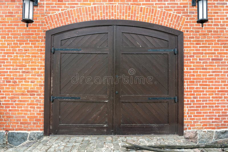 Black Wooden, Old Gate in a Brick Wall Stock Photo - Image of ...
