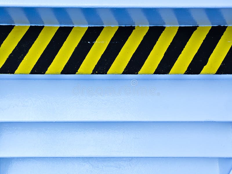 Yellow Diagonal Stripes between Parallel Lines Painted on a Paved Road ...