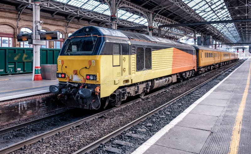 Black Yellow and Orange Diesel Locomotive Stock Image - Image of train ...