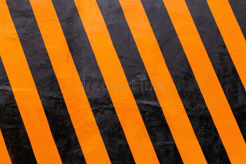 Black and Yellow Stripes on the Road Divider Wall. Roadside Safety ...