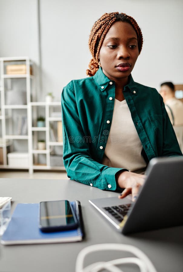 Black Young Woman Programming in Office Stock Photo - Image of screen ...