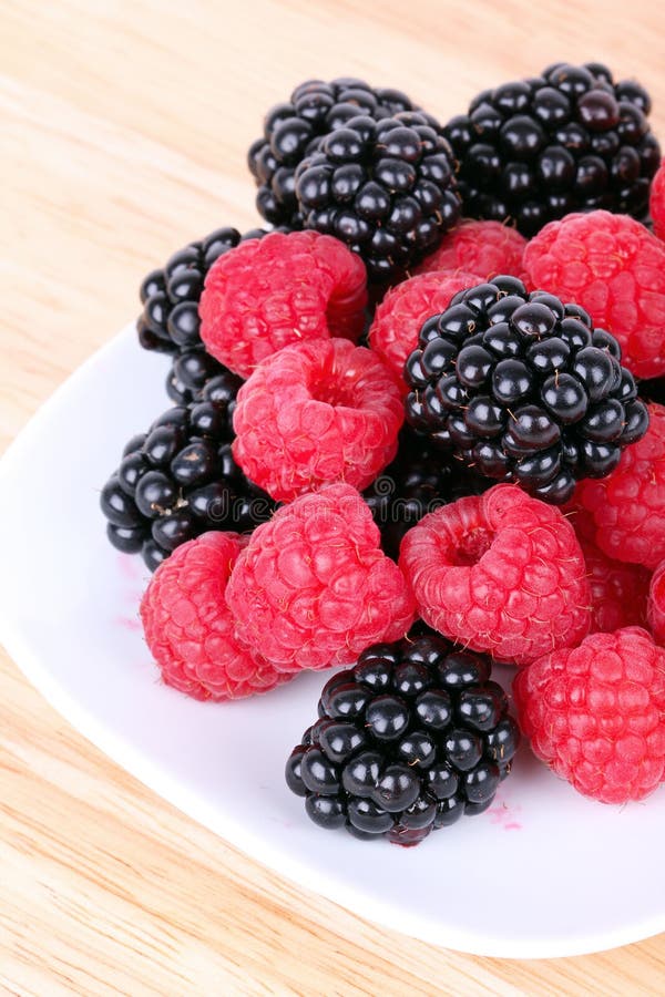 Blackberry and Raspberries on White Plate Stock Photo - Image of juicy ...