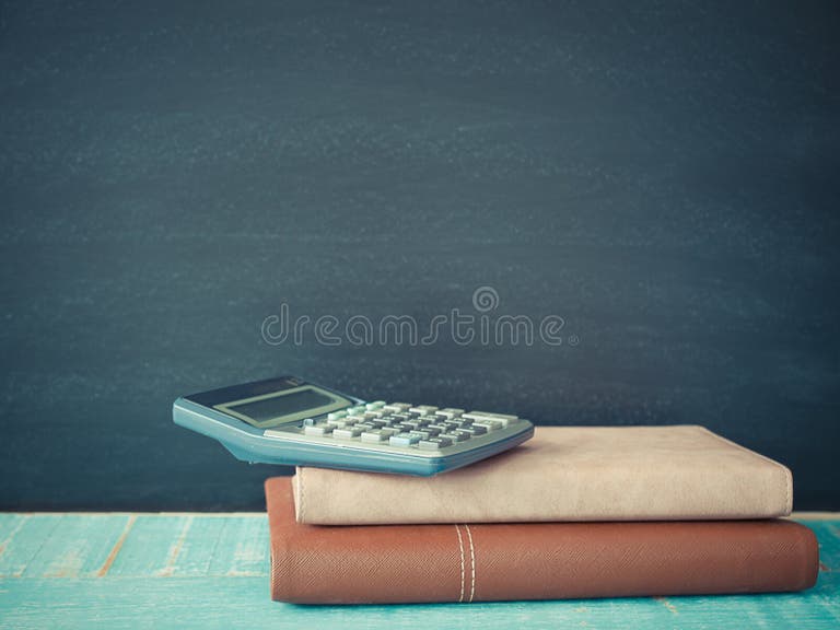 Blackboard, Books and Calculators. with Free Space for Text Stock Photo ...